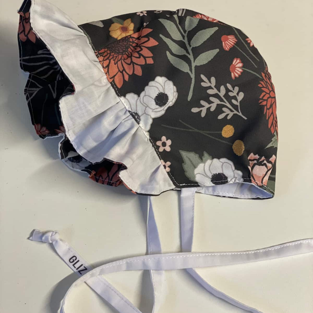 Gliz Design : Baby Bonnet : Flare - Moody Colorful Florals