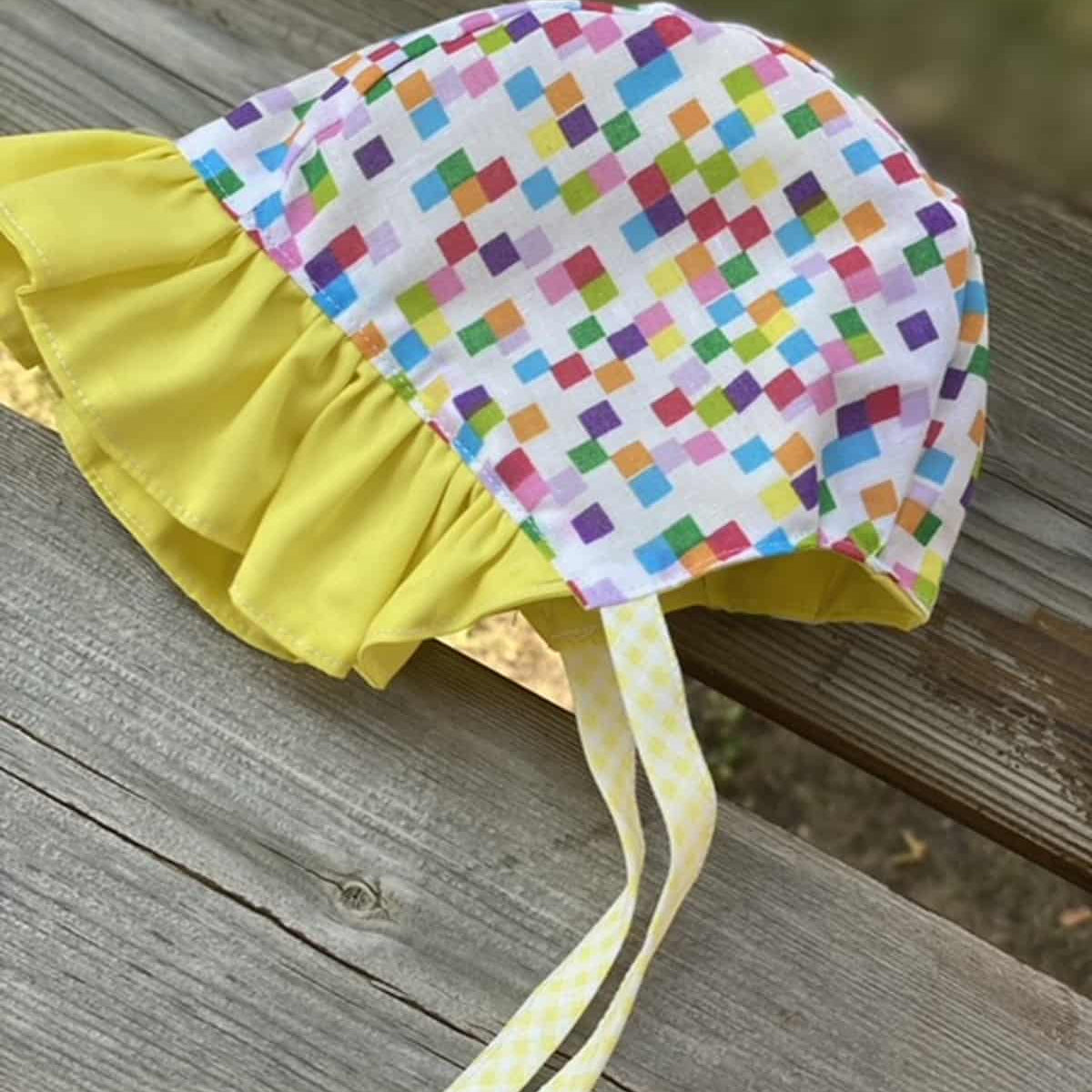 Gliz Design : Baby Bonnet : Ruffles - Yellow & Colorful Squares